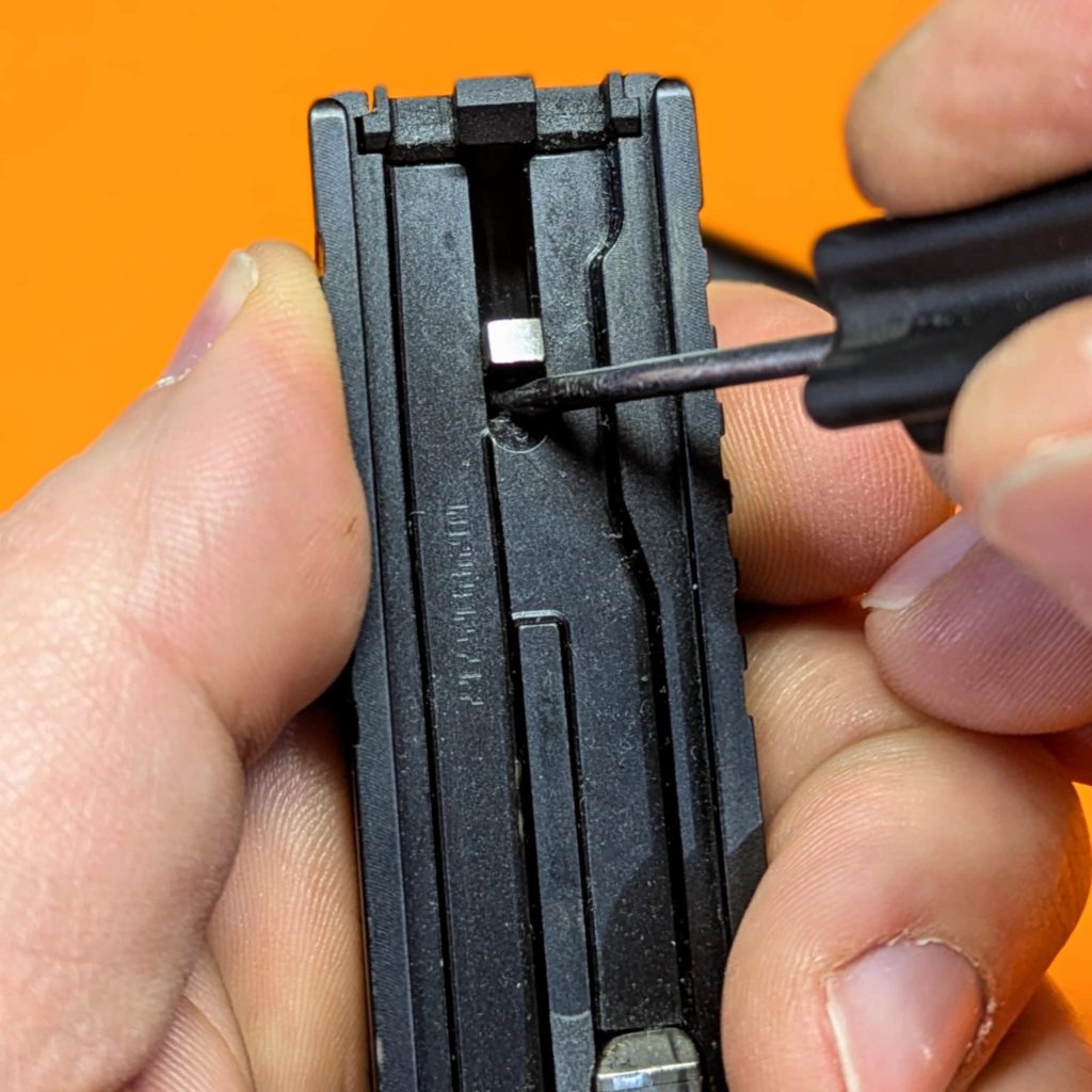 push down on spacer sleeve to remove glock backplate - Schiwerks